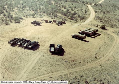 Missile Range View Of Military Trucks And Tents Green River J