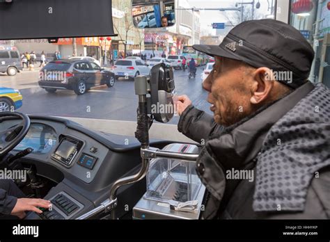 Chinese Passenger Using Swipe Card To Board Bus In Yinchuan Ningxia