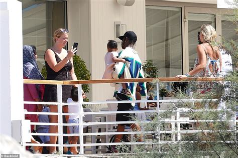 Kylie Jenner Slips Into A Corseted Mini Dress And Kooky Specs As She And Travis Scott Head To