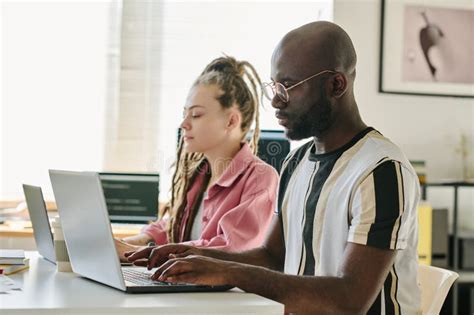 Colleagues Typing On Computers In Office Stock Photo Image Of Office