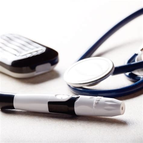 Premium Photo Personal Blood Glucose Meter And Lancet With