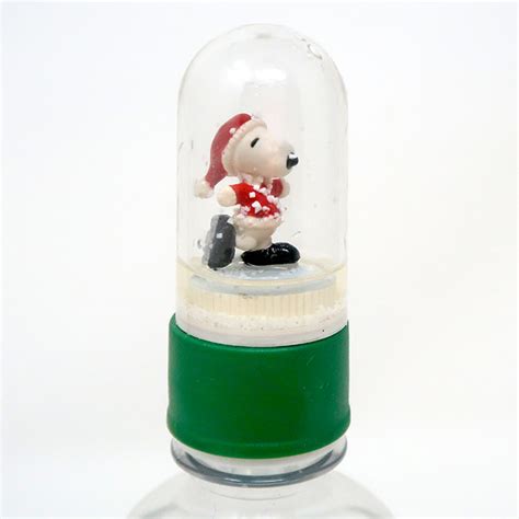 Find Of The Week Peanuts Snow Globe Bottled Water Toppers