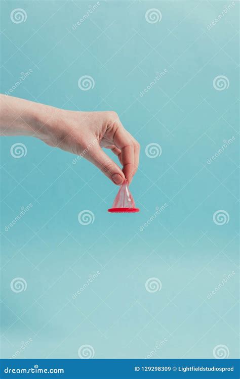 Partial View Of Woman Holding Opened Condom In Hand Stock Image Image