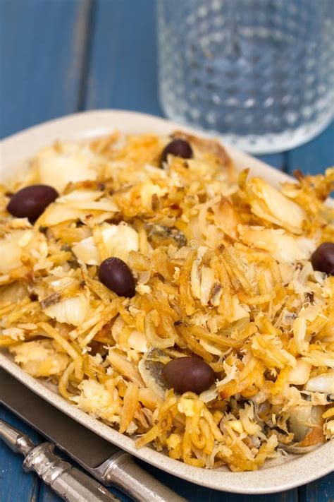 Codfish With Potato Chips And Olives Stock Image Image Of Plate