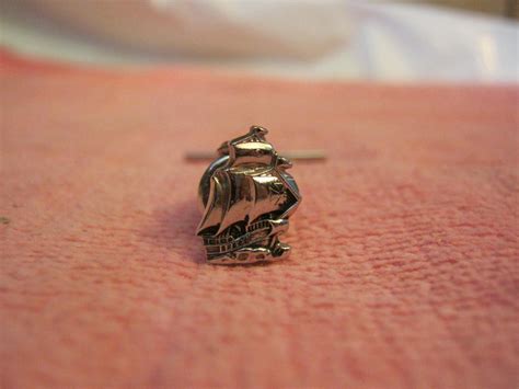 Ship Type And Lapel Pin Or Tie Tac Antiques Board