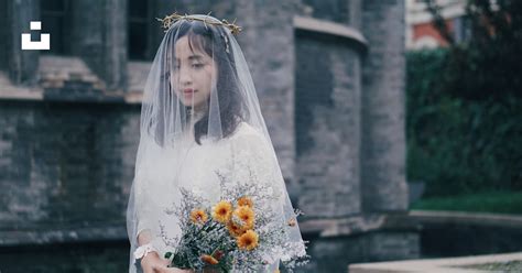 Woman Holding Orange Flower Bouquet Photo Free Female Image On Unsplash