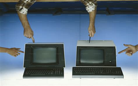 Two Hands Pointing At A Computer Monitor And Keyboard Photo Computer Image On Unsplash
