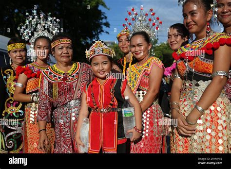 Dayak People From Different Tribes Together At A Parade In Kuching
