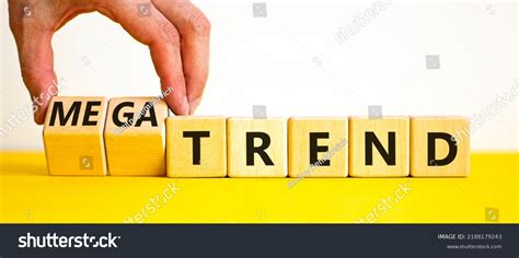 Trend Megatrend Symbol Businessman Turns Wooden Stock Photo 2188179243 ...