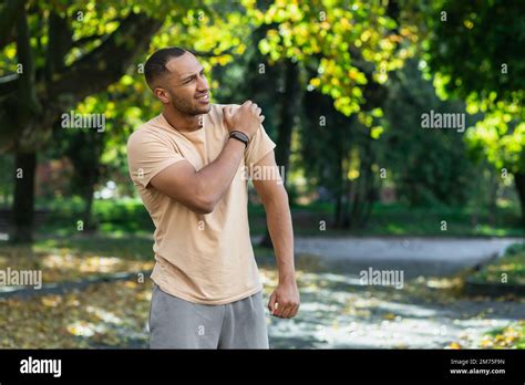 A Man Injured His Shoulder During A Fitness Class An African American