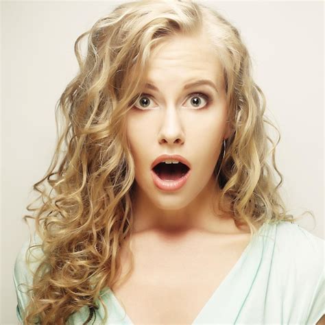 Premium Photo Surprised Young Woman