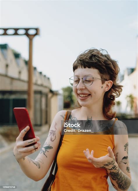 Portrait Of Millennial Woman With Tattoos Woman Who Looks Like Nonbinary Or Retro Styled Using