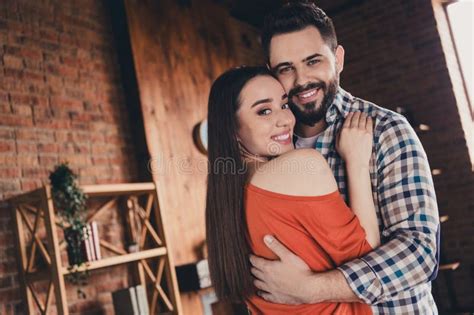 Photo Of Cheerful Cute Young Couple Cuddle Cheerful Tenderness Enjoy Weekend Have Fun Buy New