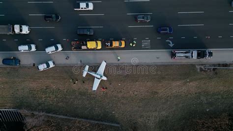 Emergency Airplane Landing On Highway Wide Drone Shot Stock Footage