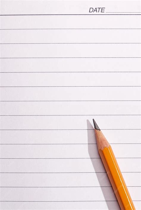Premium Photo Pencil On Piece Of Lined Notebook Paper