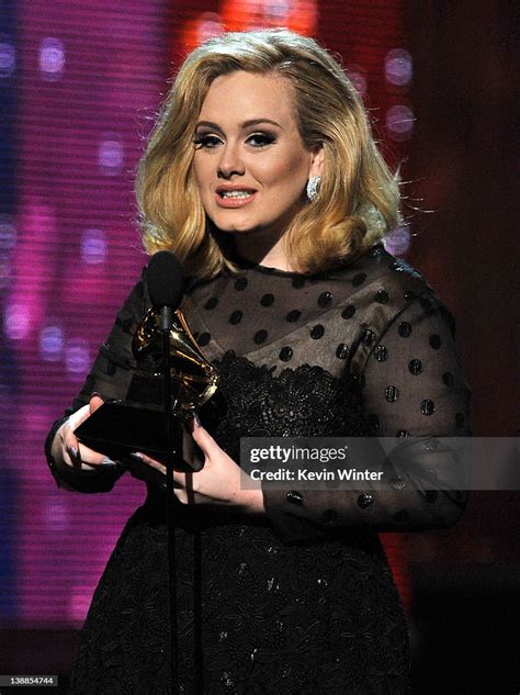 Singer Adele Accepts The Award For Song Of The Year Onstage At The
