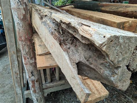 Old Log Square Pillars That Are Porous Due To Age And Eaten By Termites