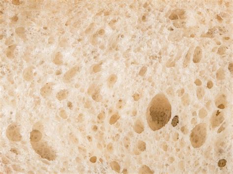 Premium Photo Rustic Closeup Of Sliced Bread Texture From Top View