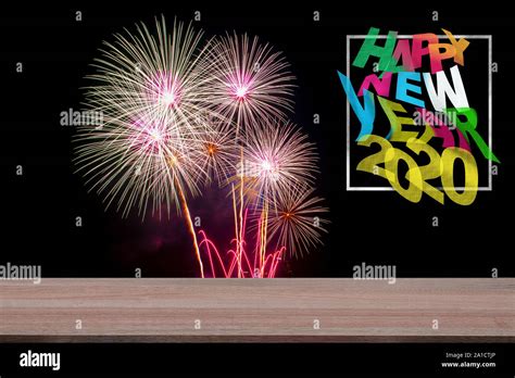 Happy New Year Celebration Text With Festive Fireworks In Night Sky Stock Photo Alamy