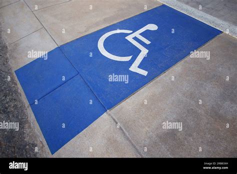 Accessibility Ramp For Wheelchair Users With Accessibility Symbol