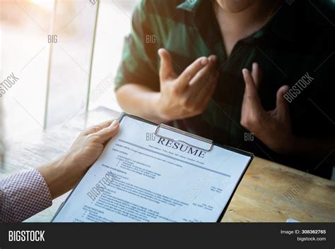 Interviewer Reading Image And Photo Free Trial Bigstock