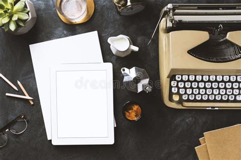 Top View Shot Of Desktopwith A Typewriter White Magazine And Blank
