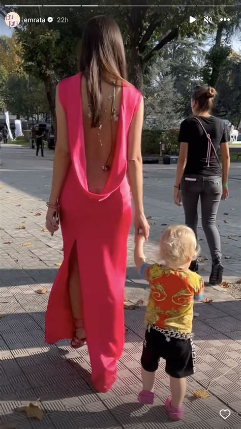 Emily Ratajkowski Gets Cheeky In Butt Crack Baring Dress