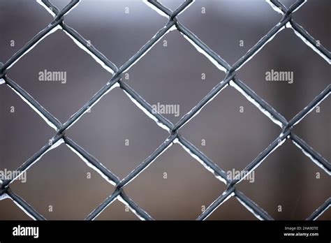 Metal Old Rusty Mesh Covered With Ice Deteriorating Weather Conditions