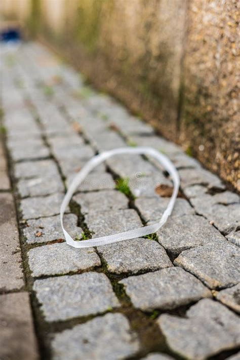 Plastic Loop Left On The Street Representing A Danger For Pedestrians Stock Image Image Of