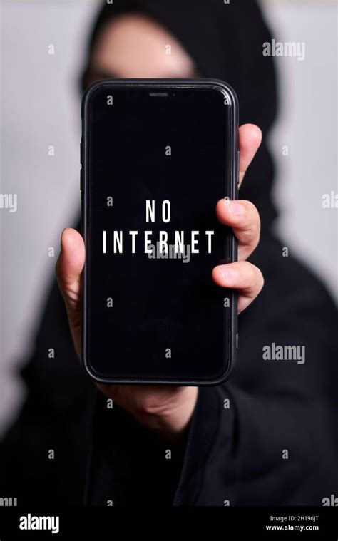 Muslim Woman Holding Smartphone With Text No Internet Symbol Internet Restrictions