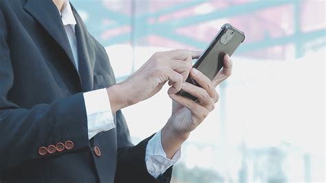businessman using tablet analyzing sales data and economic growth graph