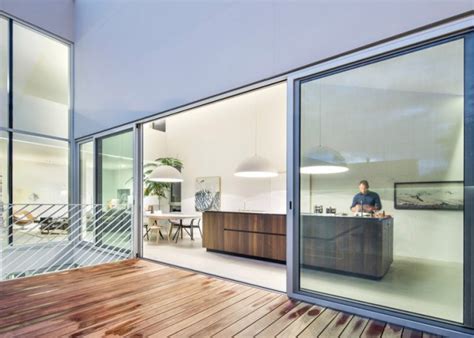 Holy Cross House By Tba Planned Around A Courtyard