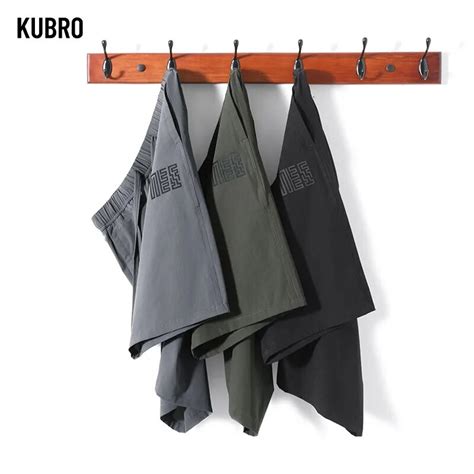 Kubro 정장 반바지 입고 얼음 실크 바지 캐주얼 다섯 조각 남성 느슨한 패션 여름 한국 버전 세련된 체육관 남성 2023