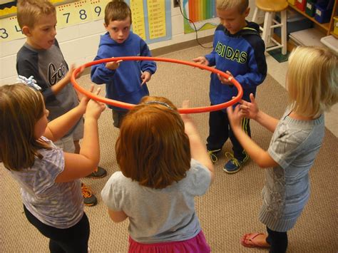 7 Fun Hula Hoop Games Team Building Activities For Adults Simple Team Building Activities