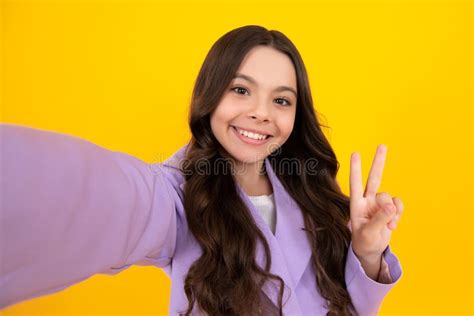 Fashion Teen Girl In Trendy Wear Making Selfie Posing On Yellow