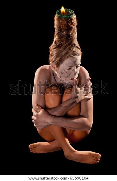 Naked Girl Candlestick On Black Background Stock Photo