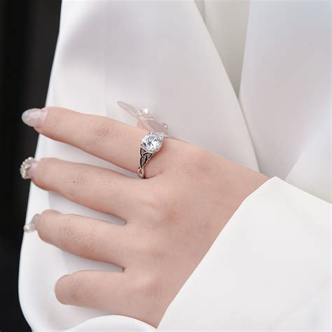925 Sterling Silver Interwoven Lines Round 2 Karat Moissanite Ring