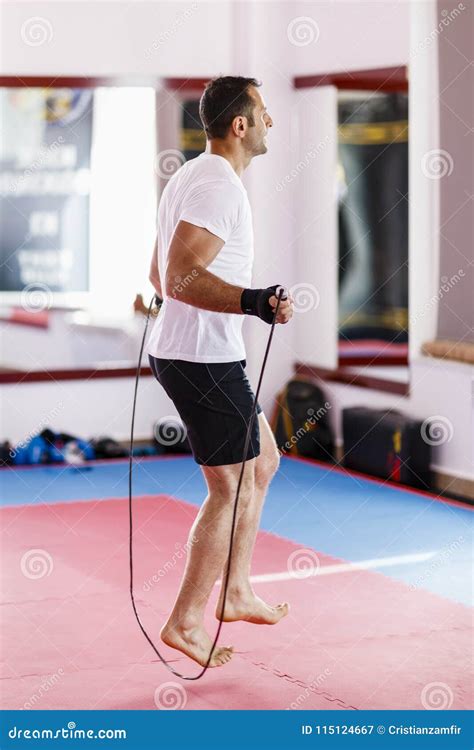 Man Is Warming Up With A Jumping Rope In Gym Stock Image Image Of