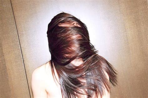 Premium Photo Woman With Hair Covered Face Standing At Home