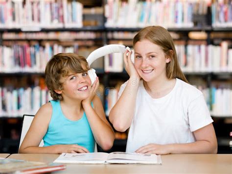 Teenage Girl And Her Brother With Books Stock Image Image Of Homework