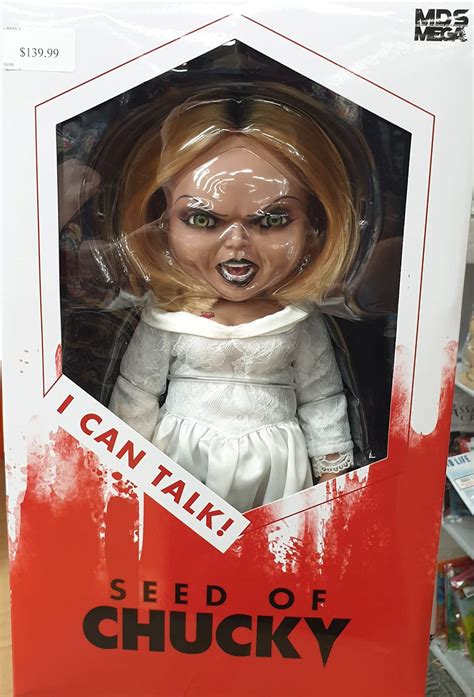 Buy Tiffany Is Outfitted In An All White Gown And Choker Necklace She