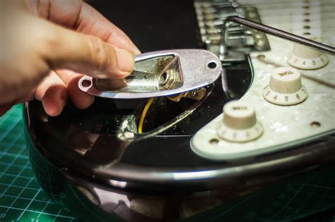 How To Tighten A Loose Input Jack On A Stratocaster Guitar