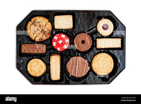 A Tin Of Foxs Biscuit Selection Biscuits On A White Background Stock