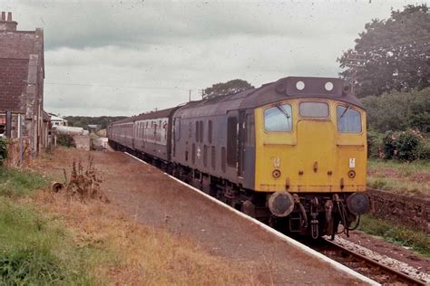 An Unidentified Class 25 Runs Into Copplestone Station During August