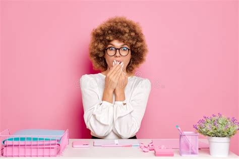 Portrait Shot Of Stunned Office Woman Works In Office Covers Mouth