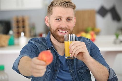 Drinking Clipart Drink Man Drinking Orange Juice At Bar Vector