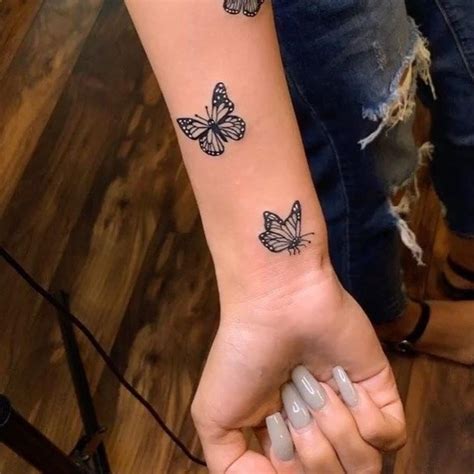 Small Butterfly Tattoos On Hand