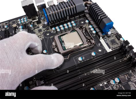 Installation Of Modern Processor In CPU Socket On The Motherboard Stock Photo Alamy