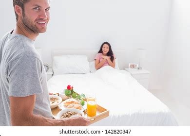 Handsome Man Bringing Breakfast His Wife Stock Photo 142820347