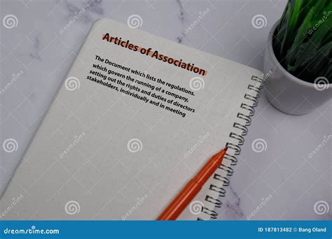 Definition Of Articles Of Association Word With A Meaning On A Book Dictionary Concept Stock